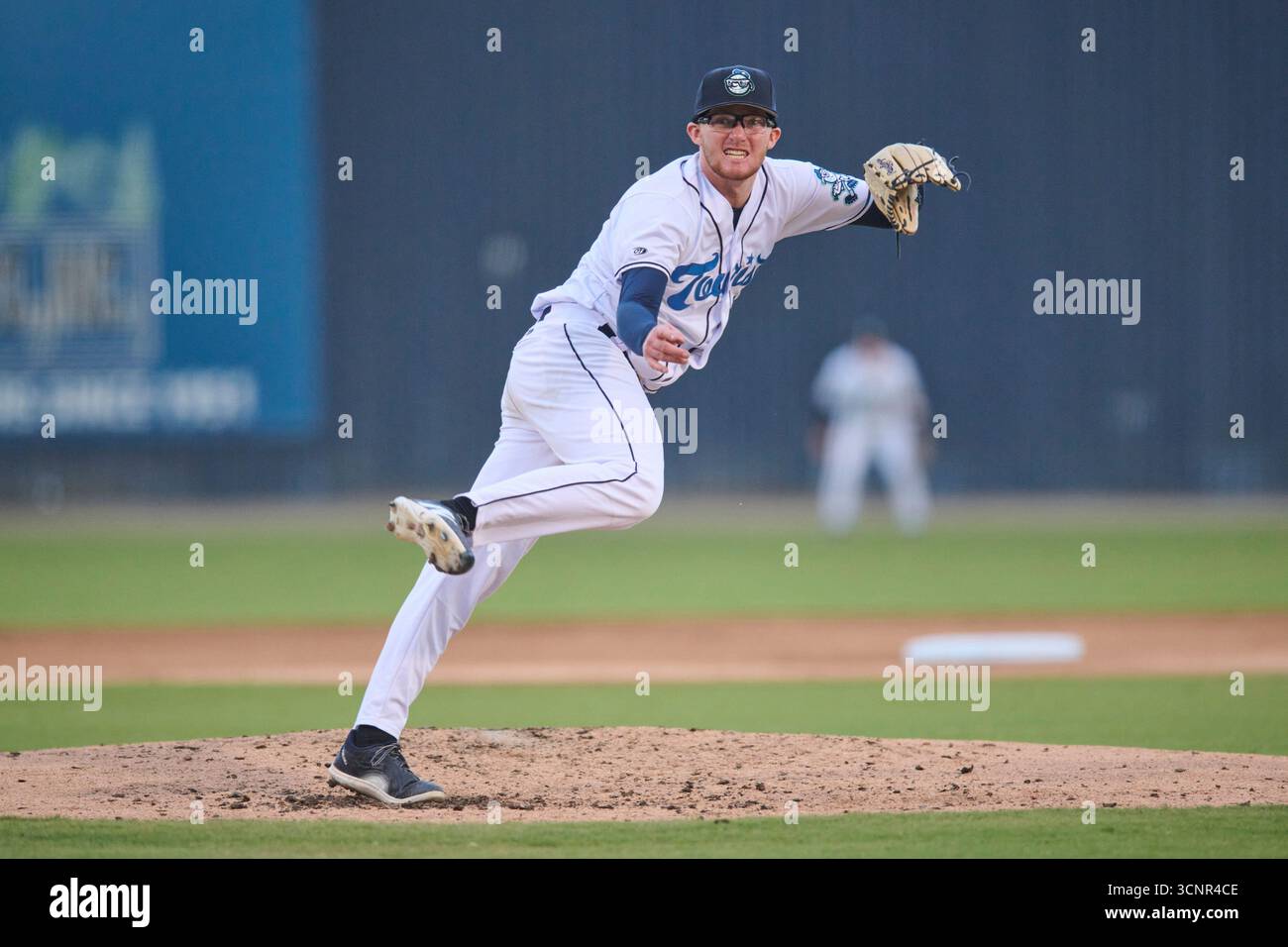 Asheville Tourists starting pitcher Dylan Howard (23) delivers a pitch ...