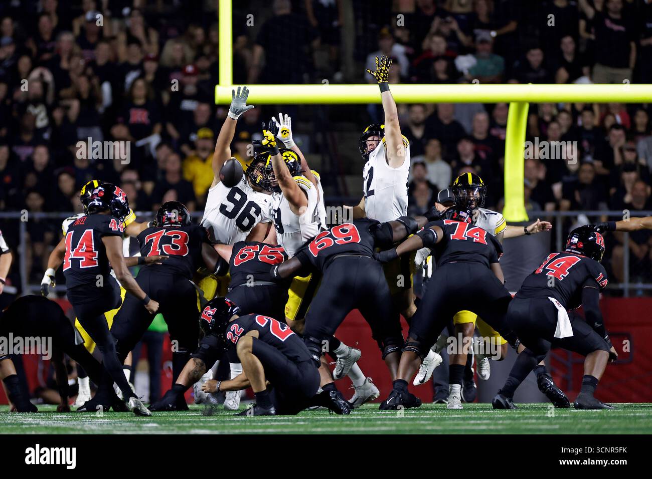 Iowa defensive lineman Bryce Hawthorne (96) defends a field goal ...