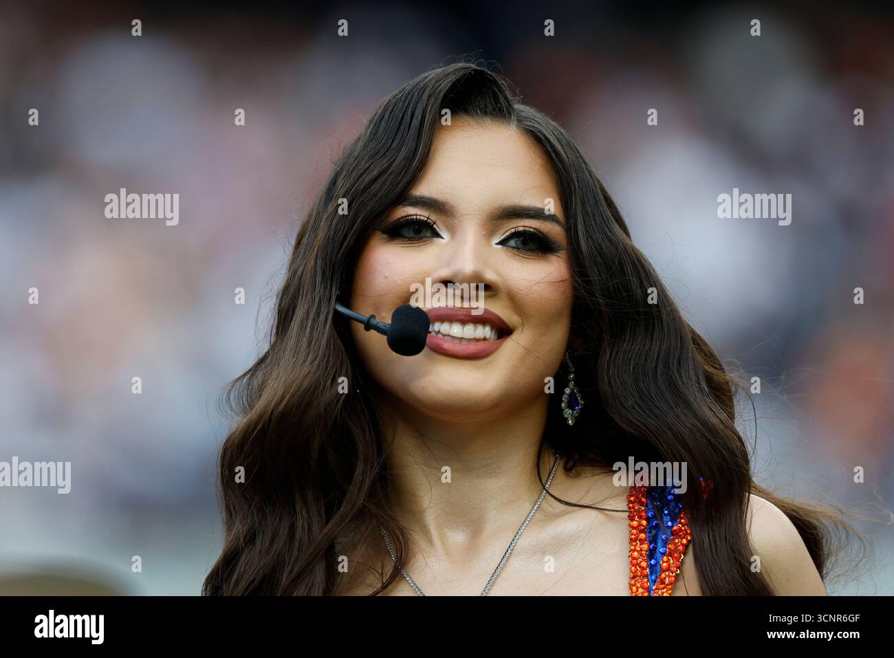 Angelina Victoria, performs at halftime of an NFL football game between ...