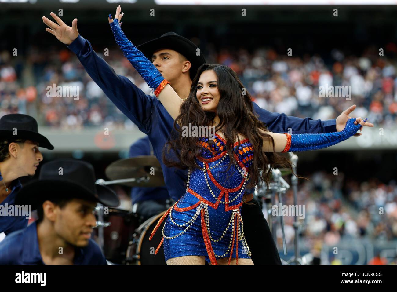 Angelina Victoria, performs at halftime of an NFL football game between ...