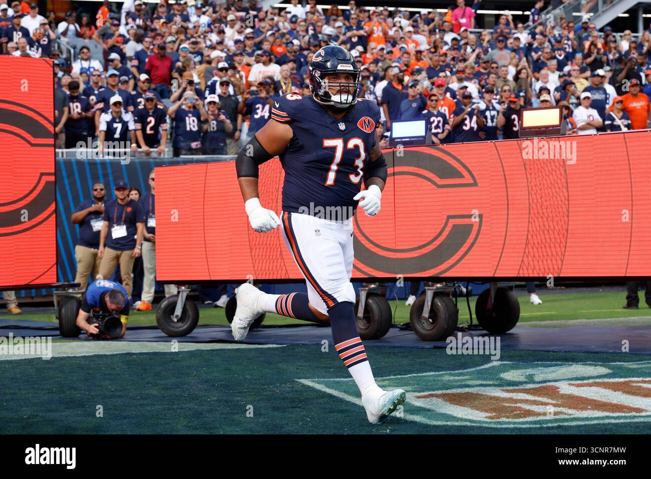 Chicago Bears guard Jonah Jackson (73) arrives on the field before an ...
