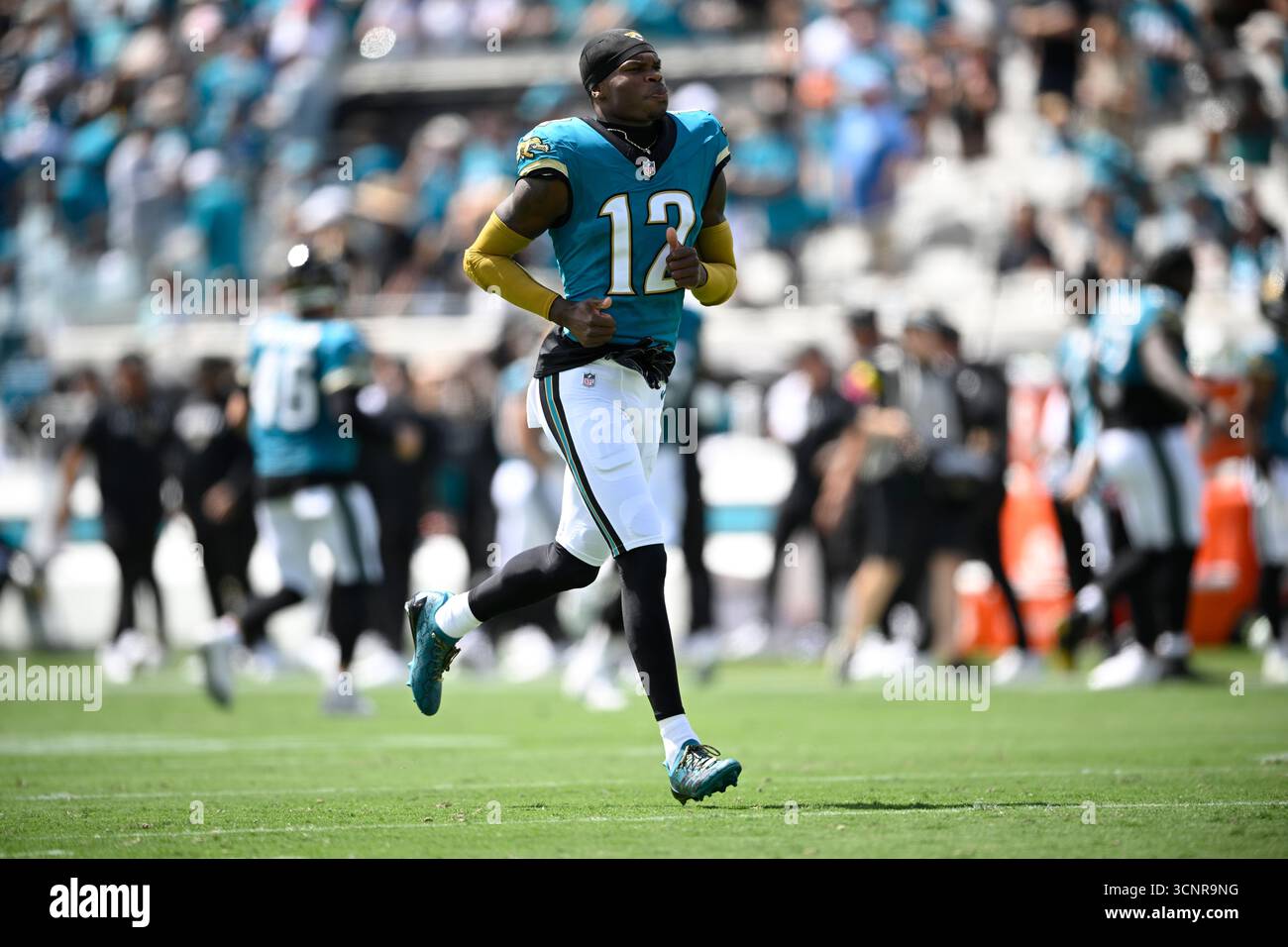 Jacksonville Jaguars wide receiver Travis Hunter (12) runs on the field ...