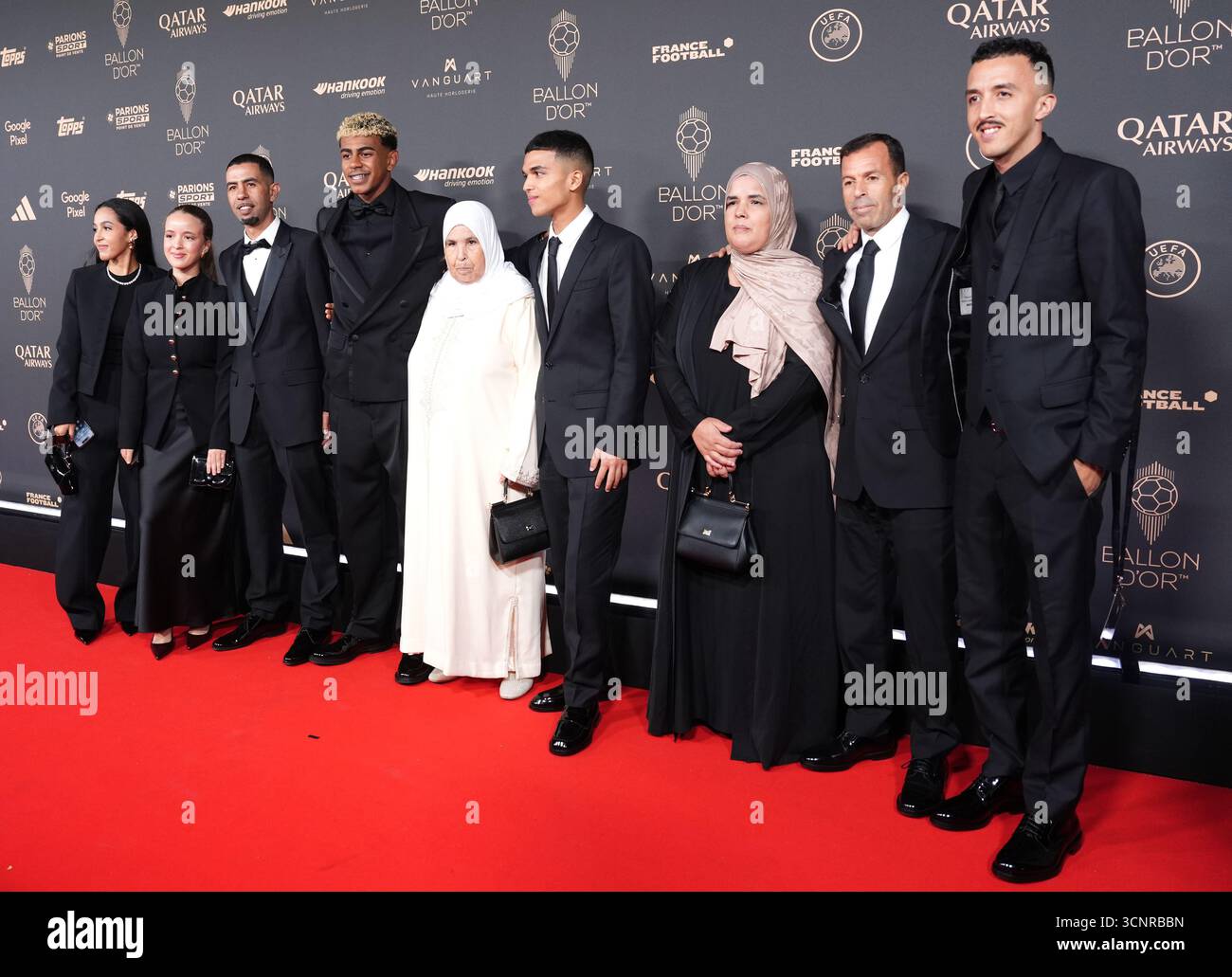 Lamine Yamal (fourth left) and family arriving at the Ballon d'Or ...