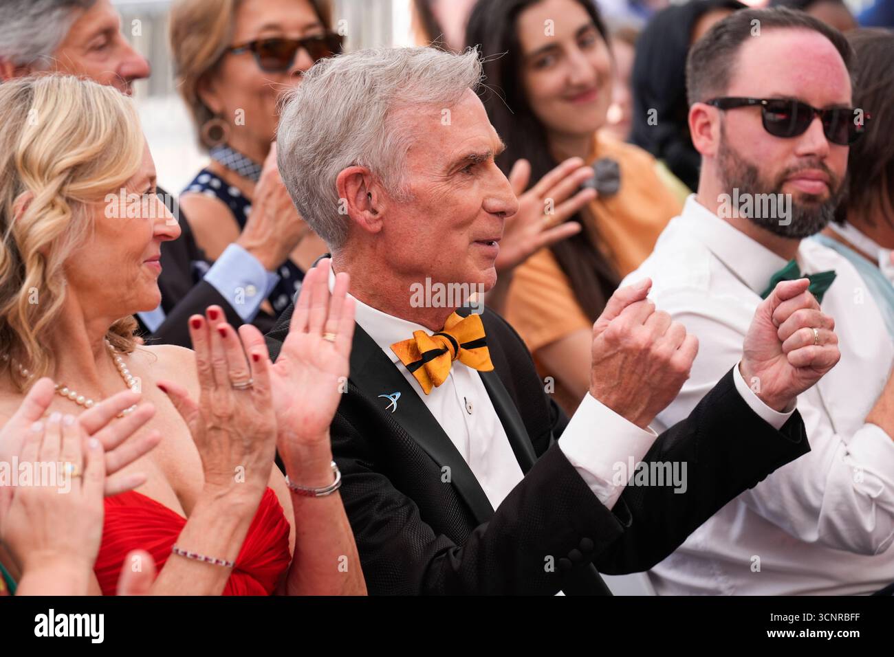 Liza Mundy, left, and Bill Nye attend a ceremony honoring Nye with a ...