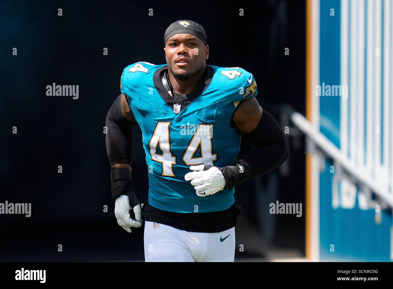 Jacksonville Jaguars defensive end Travon Walker (44) runs on the field ...