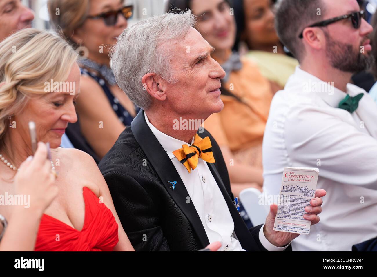 Liza Mundy, left, and Bill Nye attend a ceremony honoring Nye with a ...