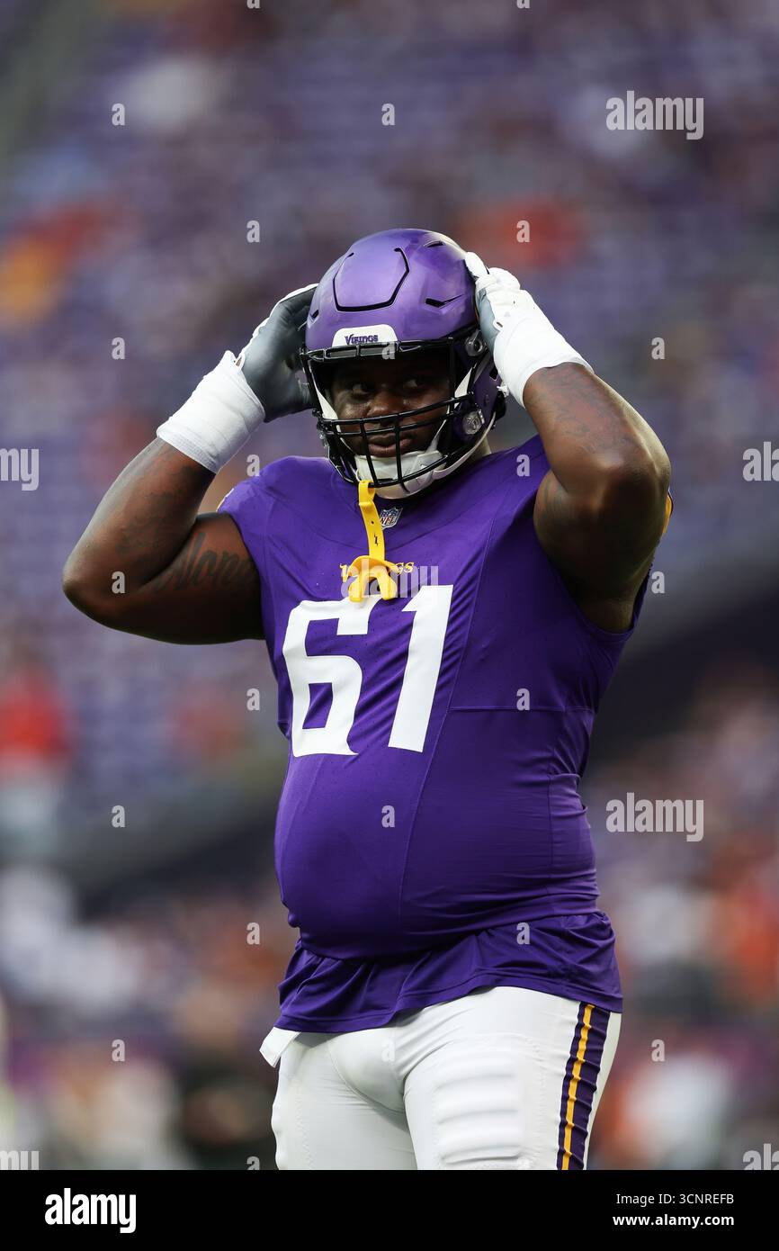 Minnesota Vikings defensive lineman Jalen Redmond (61) warms up before ...