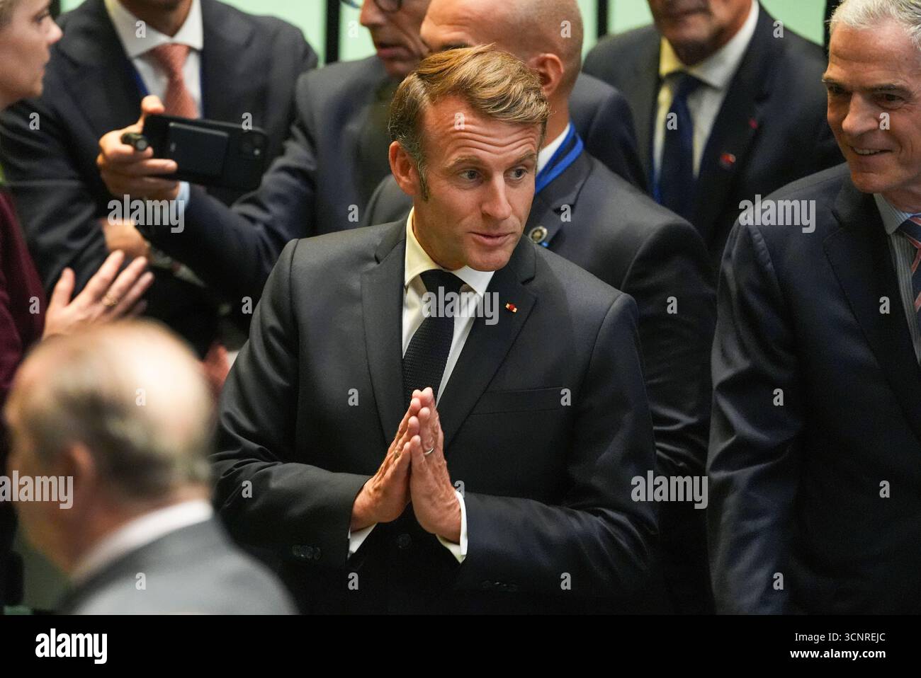 French President Emmanuel Macron, arrives inside the United Nations General Assembly Hall ...
