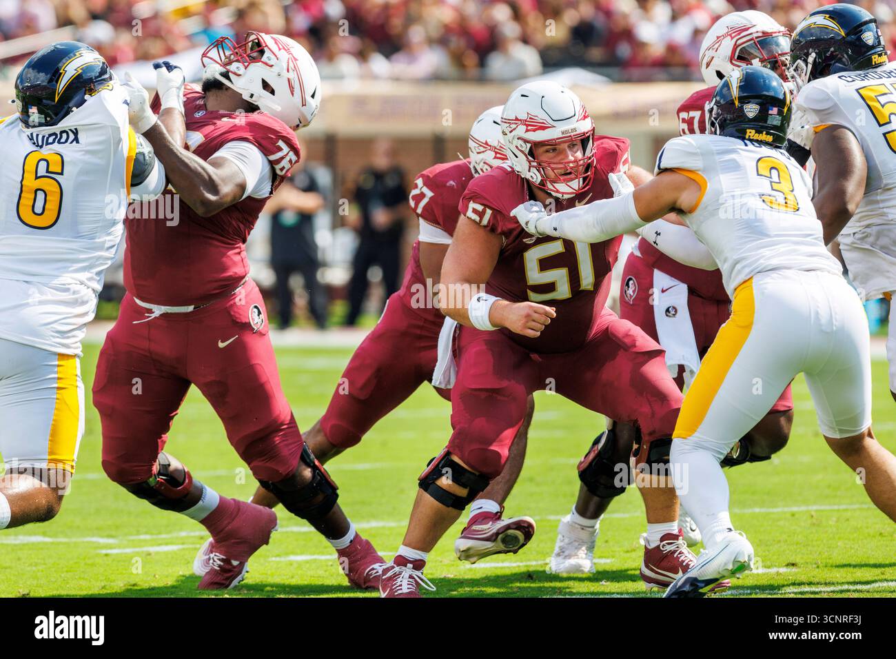 Florida State offensive linemen Adrian Medley (76) Luke Petitbon (51 ...