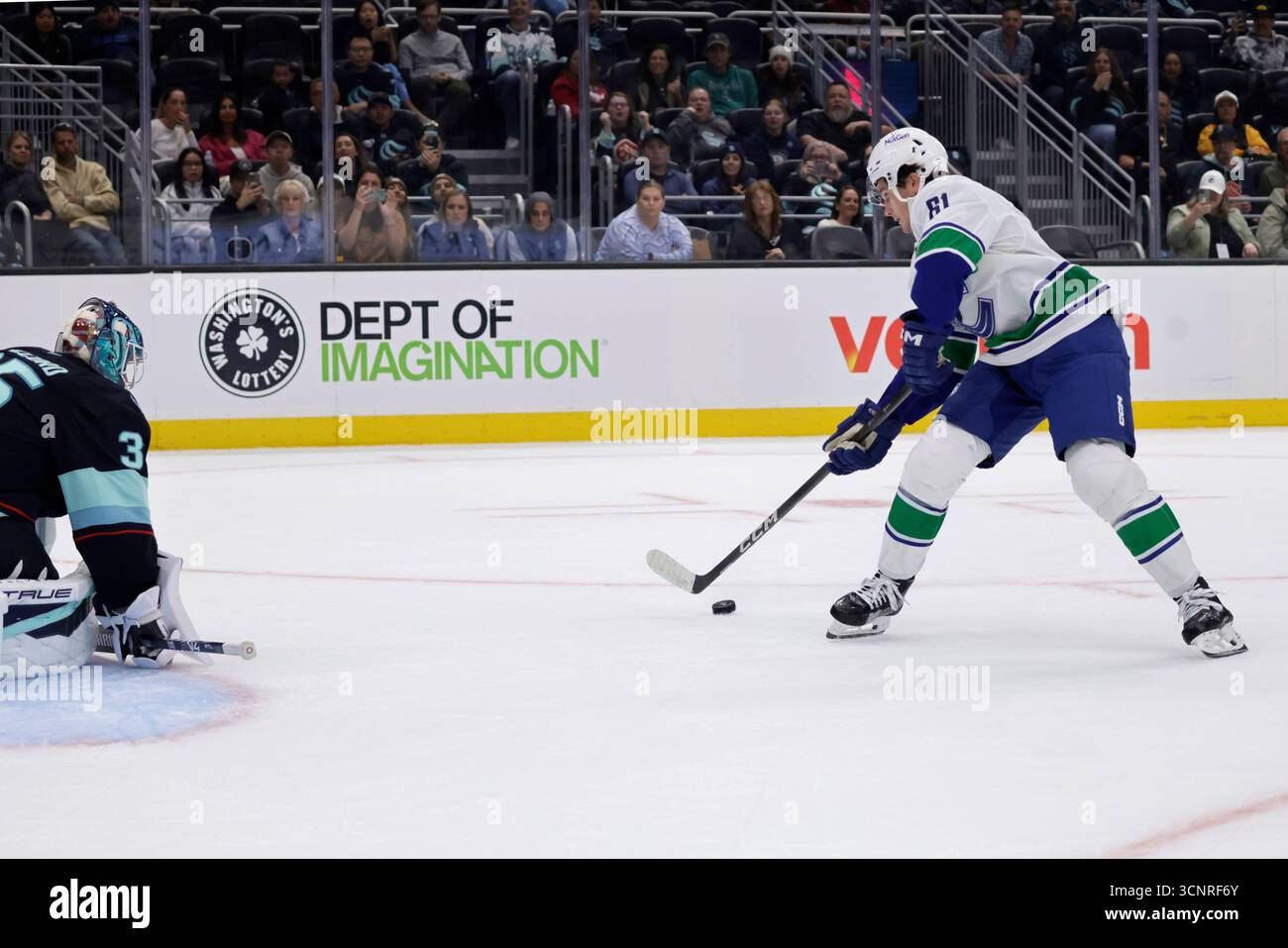 Vancouver Canucks right wing Chase Stillman (61) goes to the goal on a ...