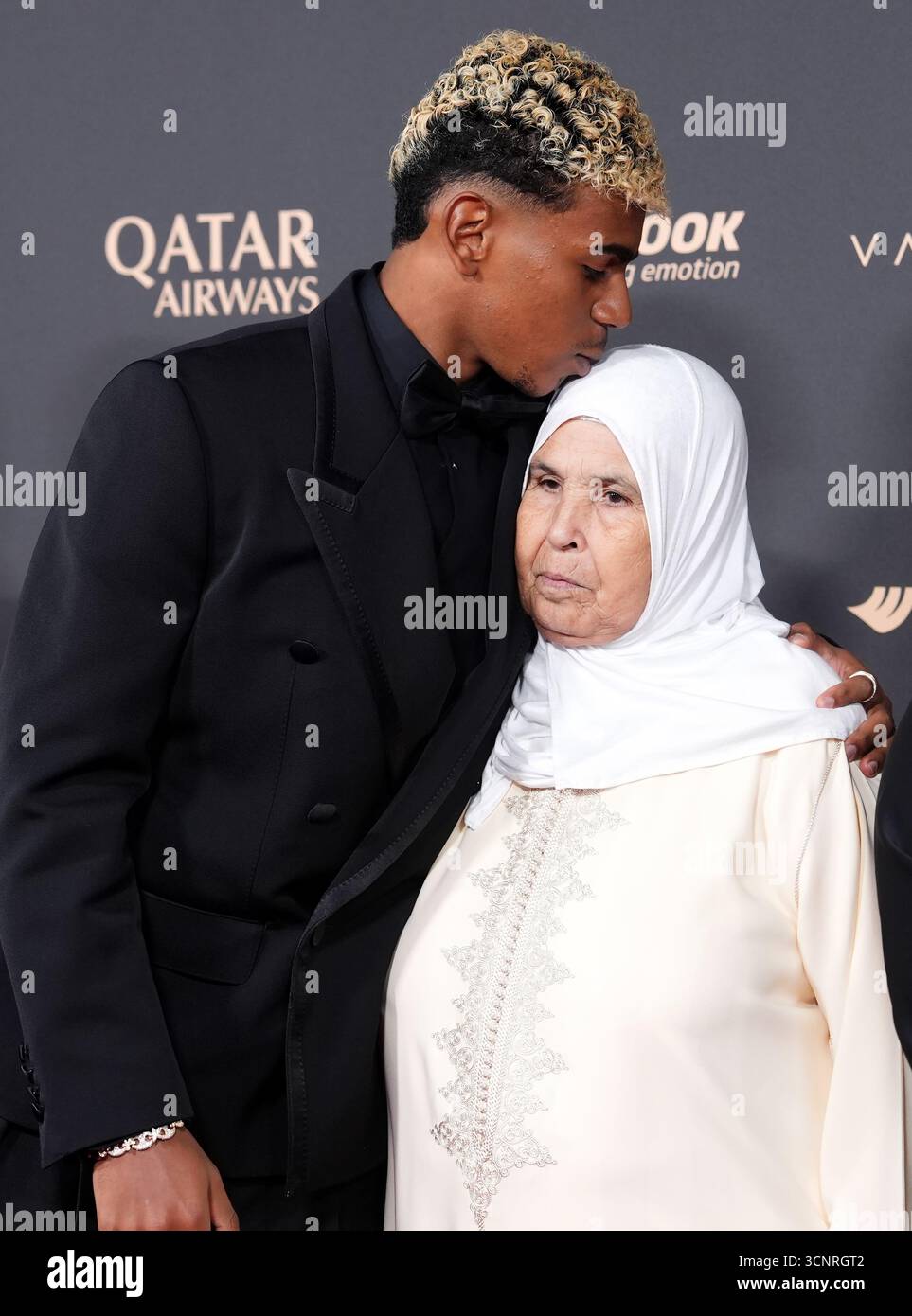 Lamine Yamal kisses his grandmother Fatima arriving at the Ballon d'Or ...