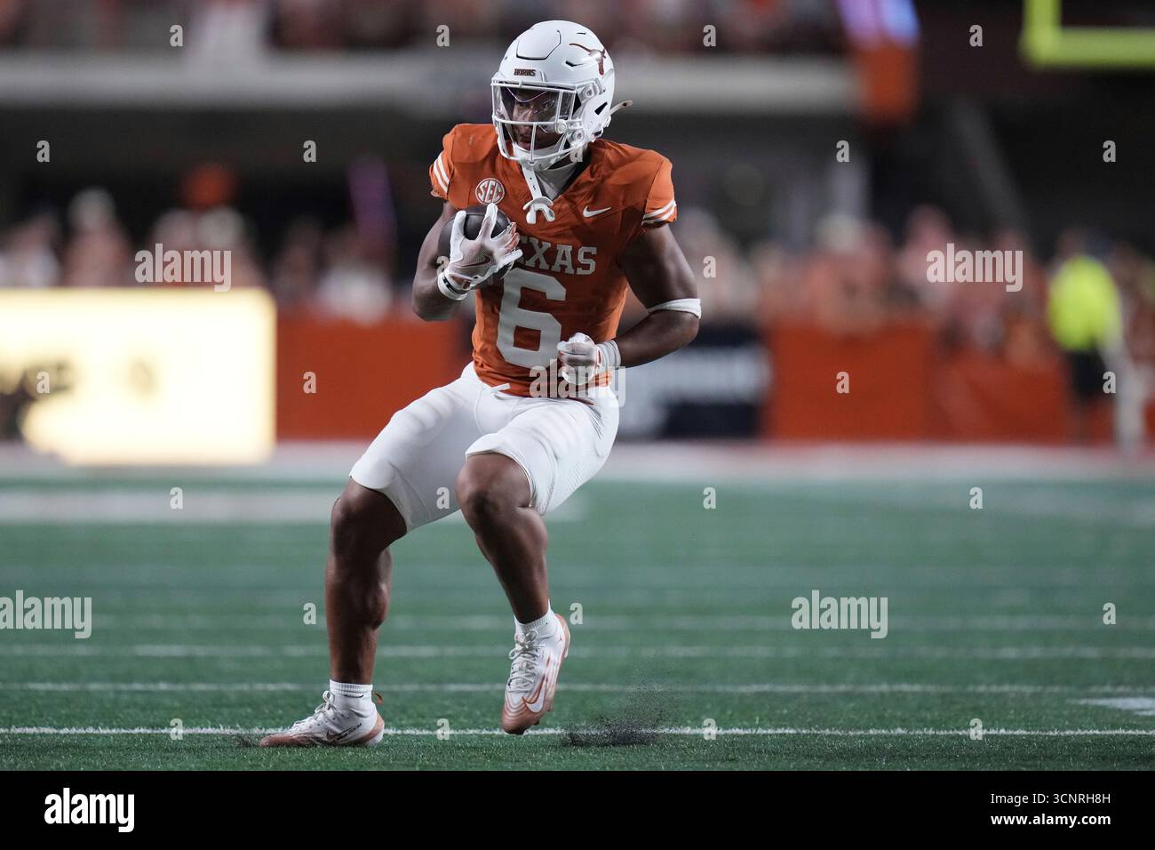 Texas running back Christian Clark (6) runs against Sam Houston State ...