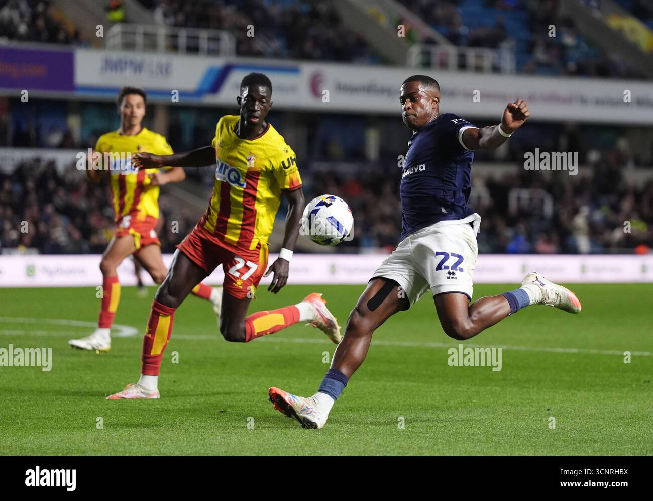 Watford's Formose Mendy and Millwall's Aidomo Emakhu (right) battle for ...