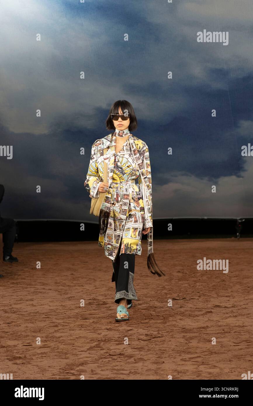 A model on the catwalk at the Burberry show in Perks Field, Kensington ...