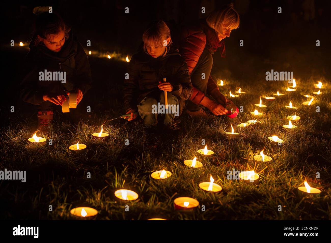 People participate in fire rituals during the Autumn Equinox ...