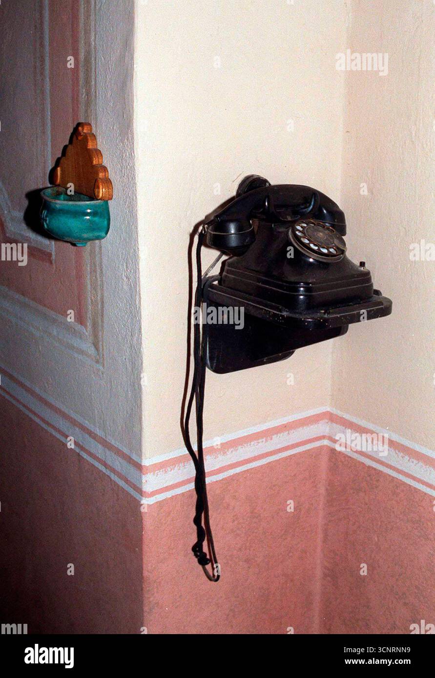 a vintage landline telephone for calling, retro phone set on a table a ...