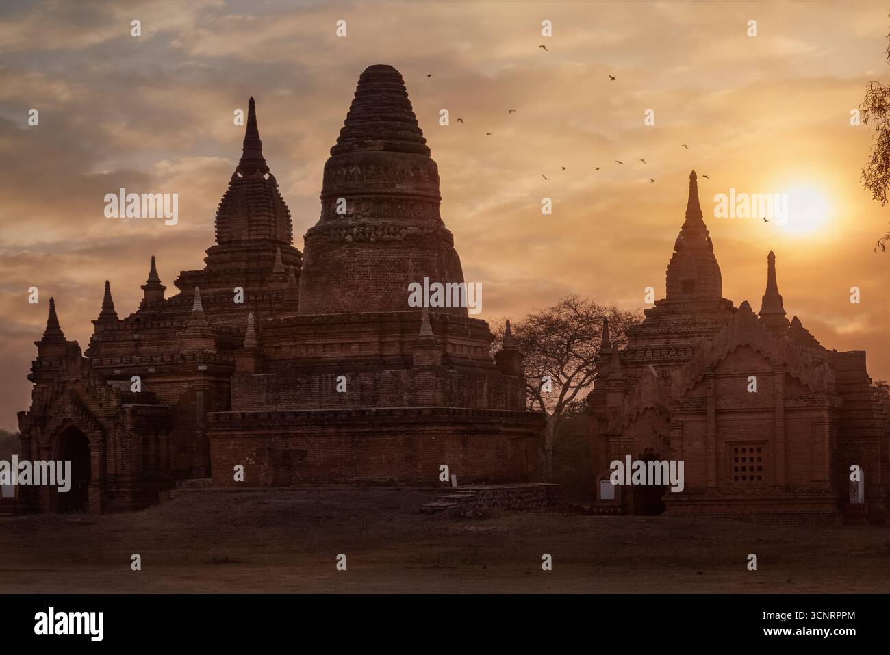 Ancient Bagan temples at sunrise in Myanmar with mystical light and ...