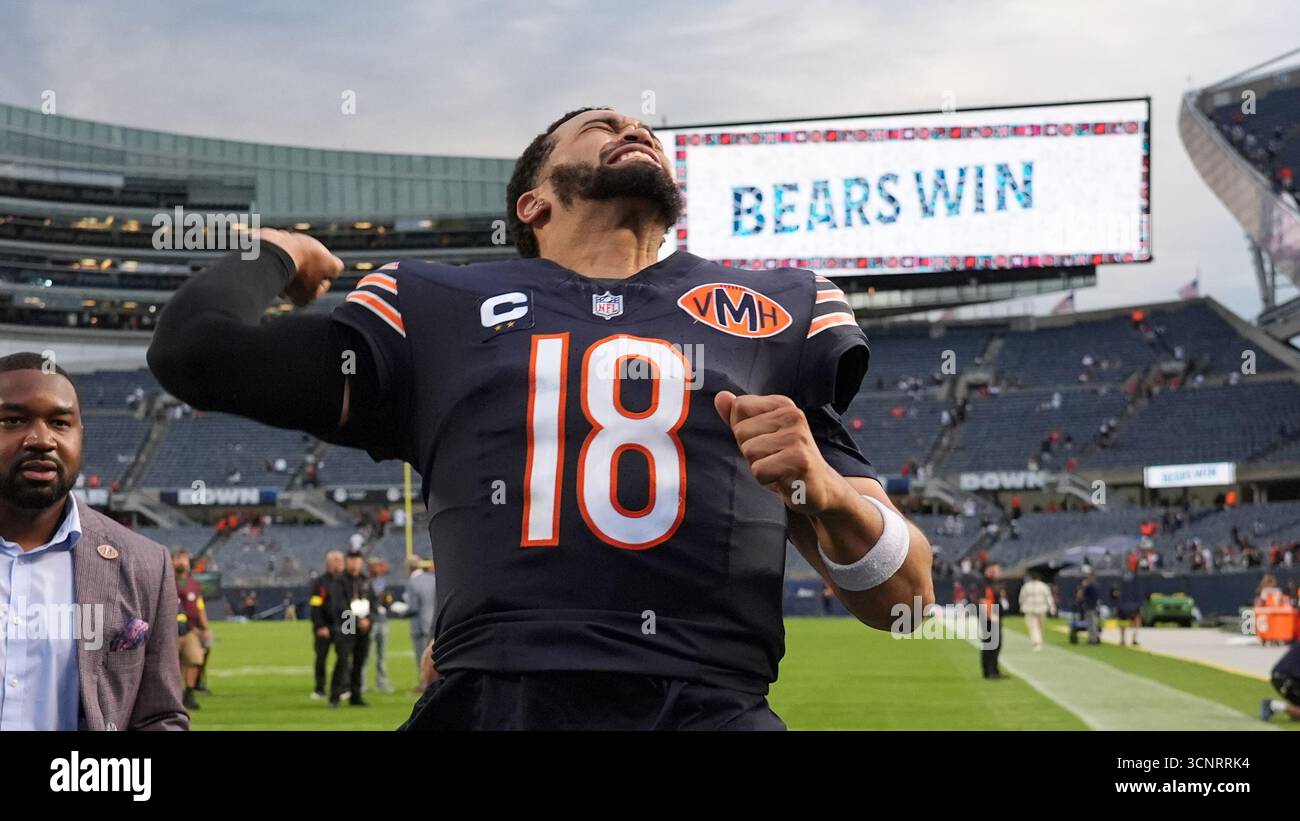 Chicago Bears quarterback Caleb Williams (18) celebrates as he walks ...