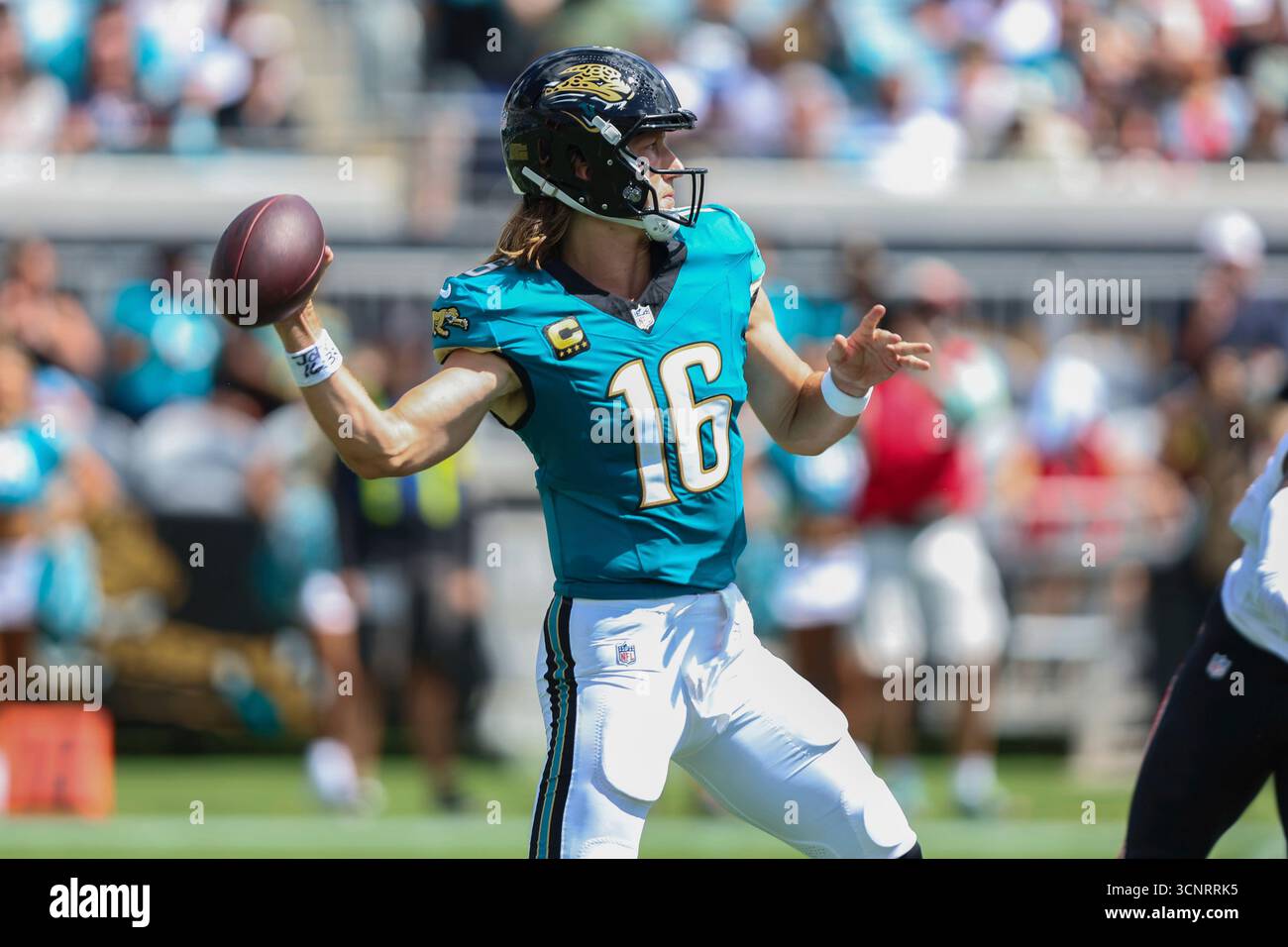 Jacksonville Jaguars quarterback Trevor Lawrence (16) throws the ball ...