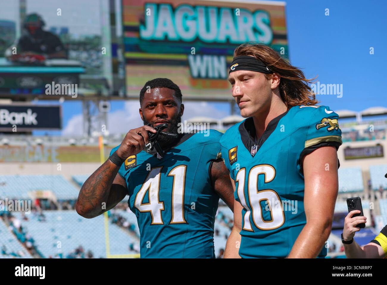 Jacksonville Jaguars defensive end Josh Hines-Allen (41) and ...