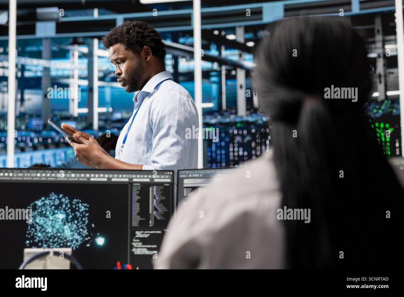 Data center technician deploys machine hi-res stock photography and ...