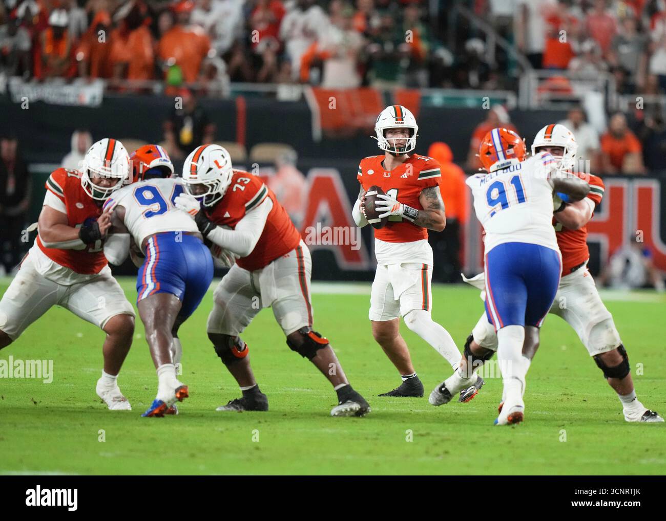 Miami quarterback Carson Beck (11) looks to pass during the first half ...