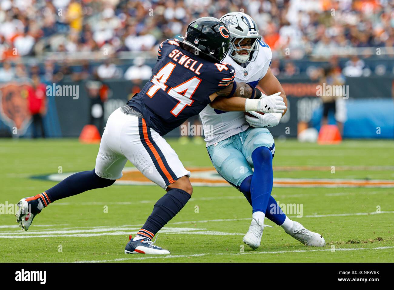Chicago Bears linebacker Noah Sewell (44) tackles Dallas Cowboys tight ...