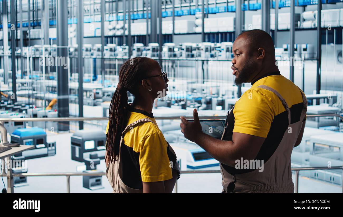 Teamworking smart factory colleagues hi-res stock photography and ...