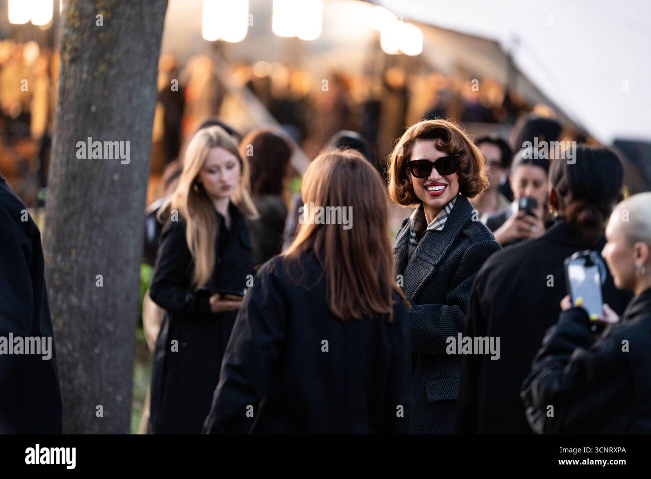 Raye attends the Burberry show during London Fashion Week September ...