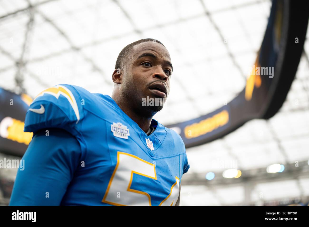 Los Angeles Chargers linebacker Kyle Kennard (54) walks back to the ...