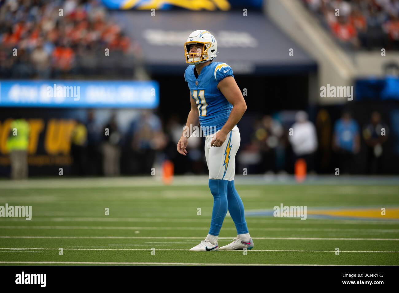 Los Angeles Chargers kicker Cameron Dicker (11) looks to kick for a ...