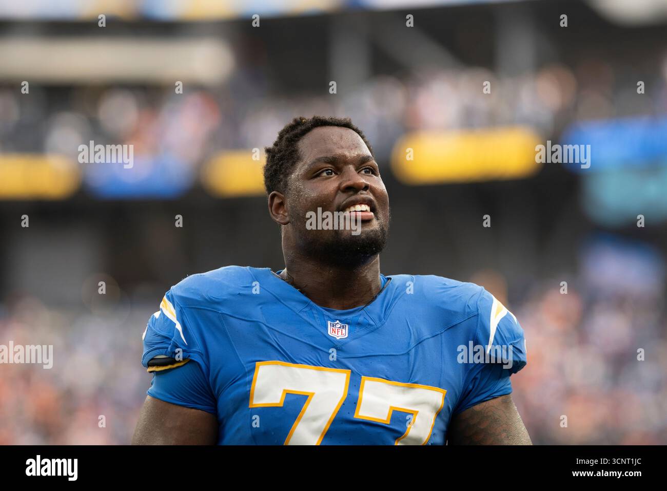 Los Angeles Chargers guard Zion Johnson (77) walks back to the locker ...