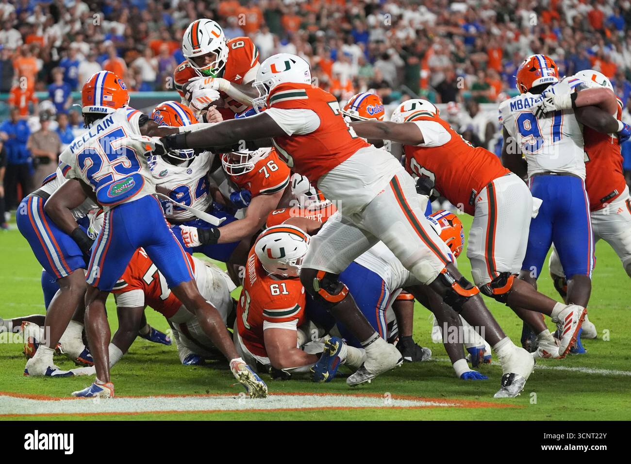 Miami running back CharMar Brown (6) scores a touchdown during the ...
