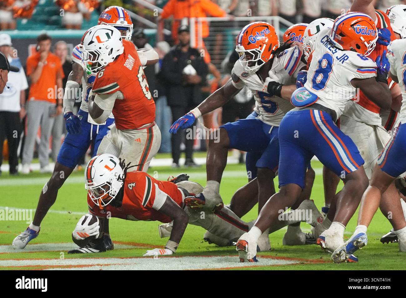 Miami running back Mark Fletcher Jr. (4) scores a touchdown during the ...
