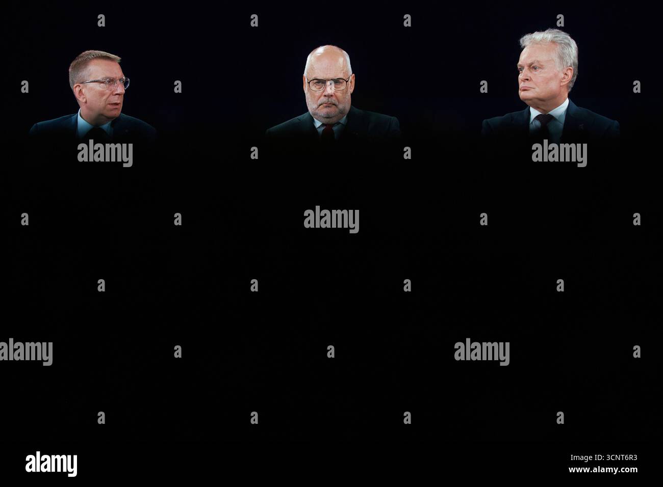 President of Latvia, Edgars Rinkevics, left, speaks next to President ...