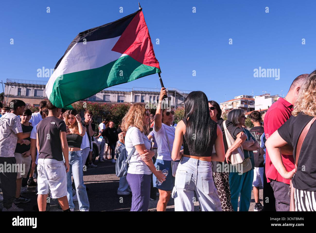 September 22, 2025, Termoli, Campobasso, Italy: A woman carrying a ...