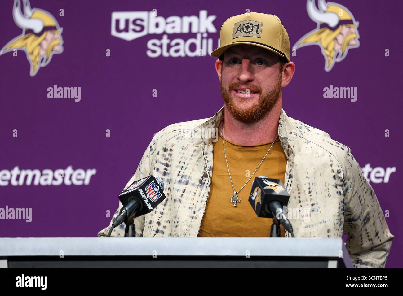 Minnesota Vikings quarterback Carson Wentz speaks after an NFL football ...