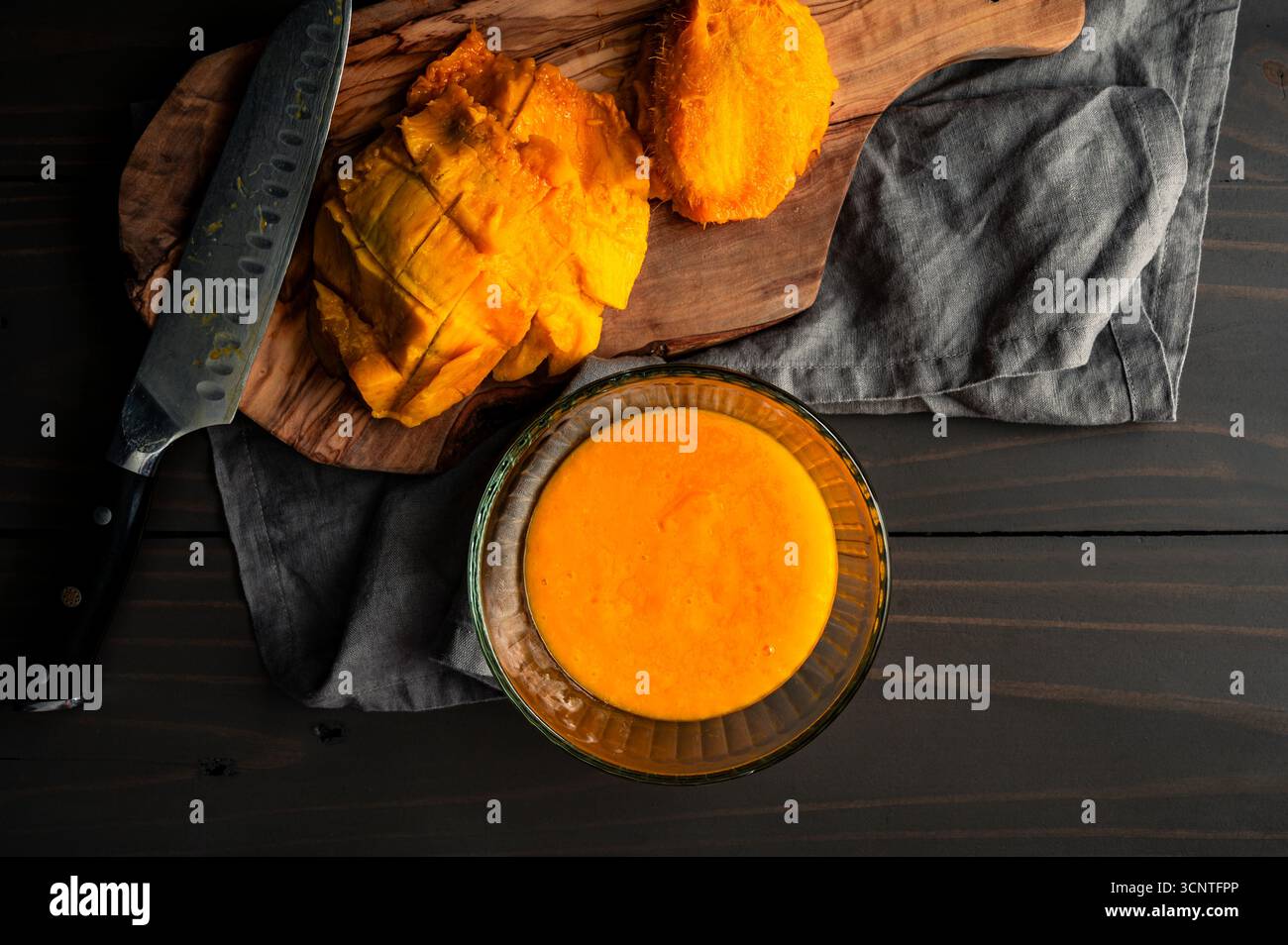 Homemade Mango Puree in a Glass Bowl: Pureed tropical fruit with mango ...