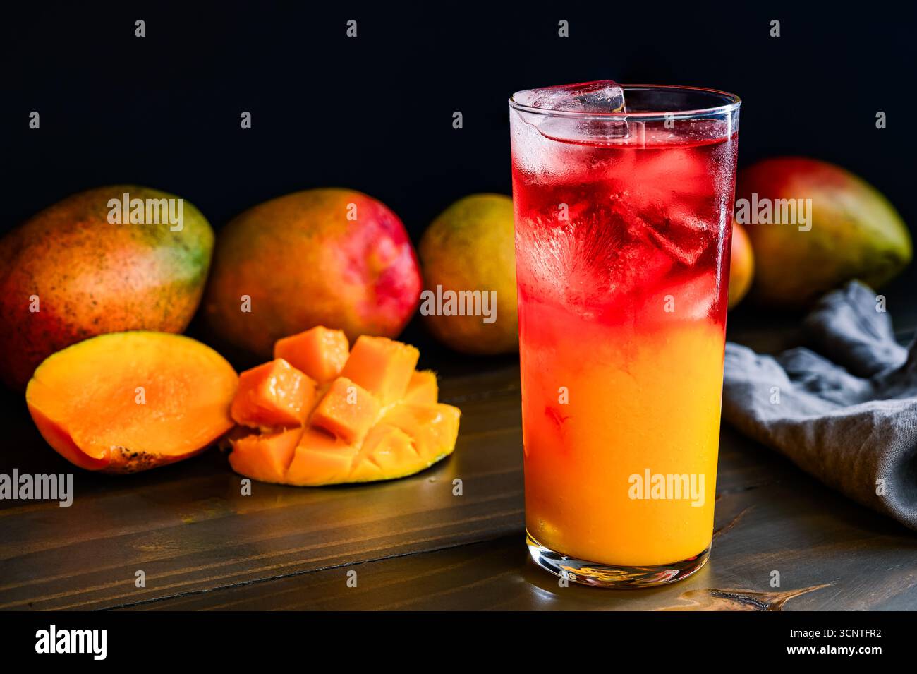 Iced Mango Hibiscus Tea Layered in a Tall Glass: Fruit and herbal tea ...