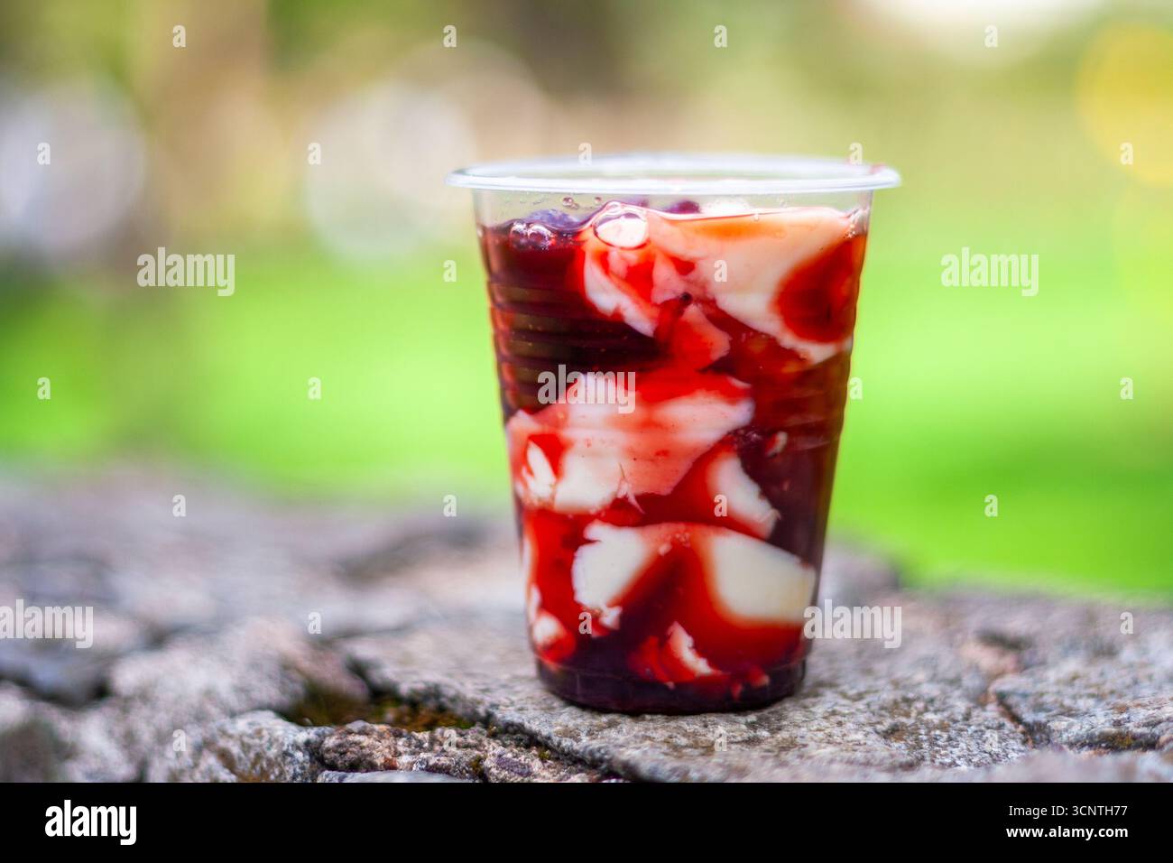 Strawberry taho, a kind of tofu dessert with strawberry jam, syrup, and ...