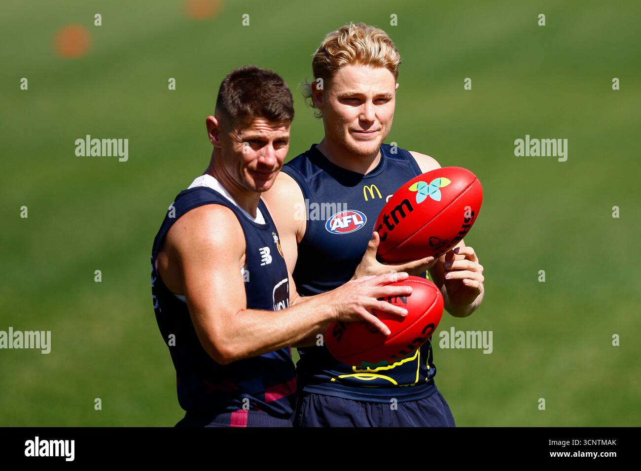 Dayne Zorko and Levi Ashcroft of the Lions are seen during a Lions AFL ...