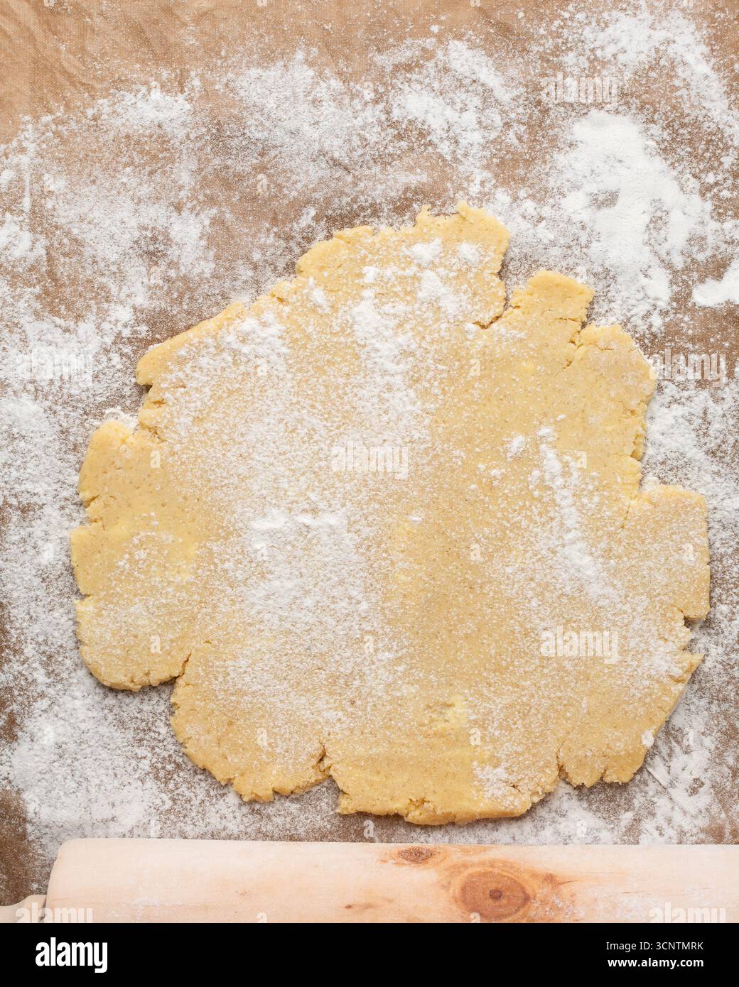 overhead view of tart shell dough rolled out, top view of rolled pie ...