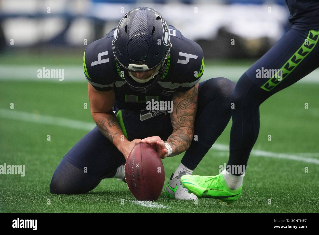 Seattle Seahawks punter Michael Dickson warms up before an NFL football ...