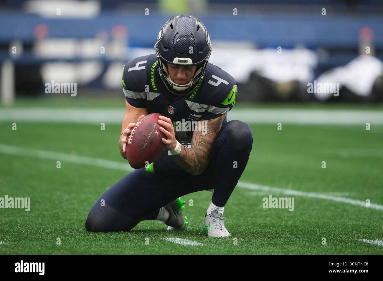 Seattle Seahawks punter Michael Dickson warms up before an NFL football ...