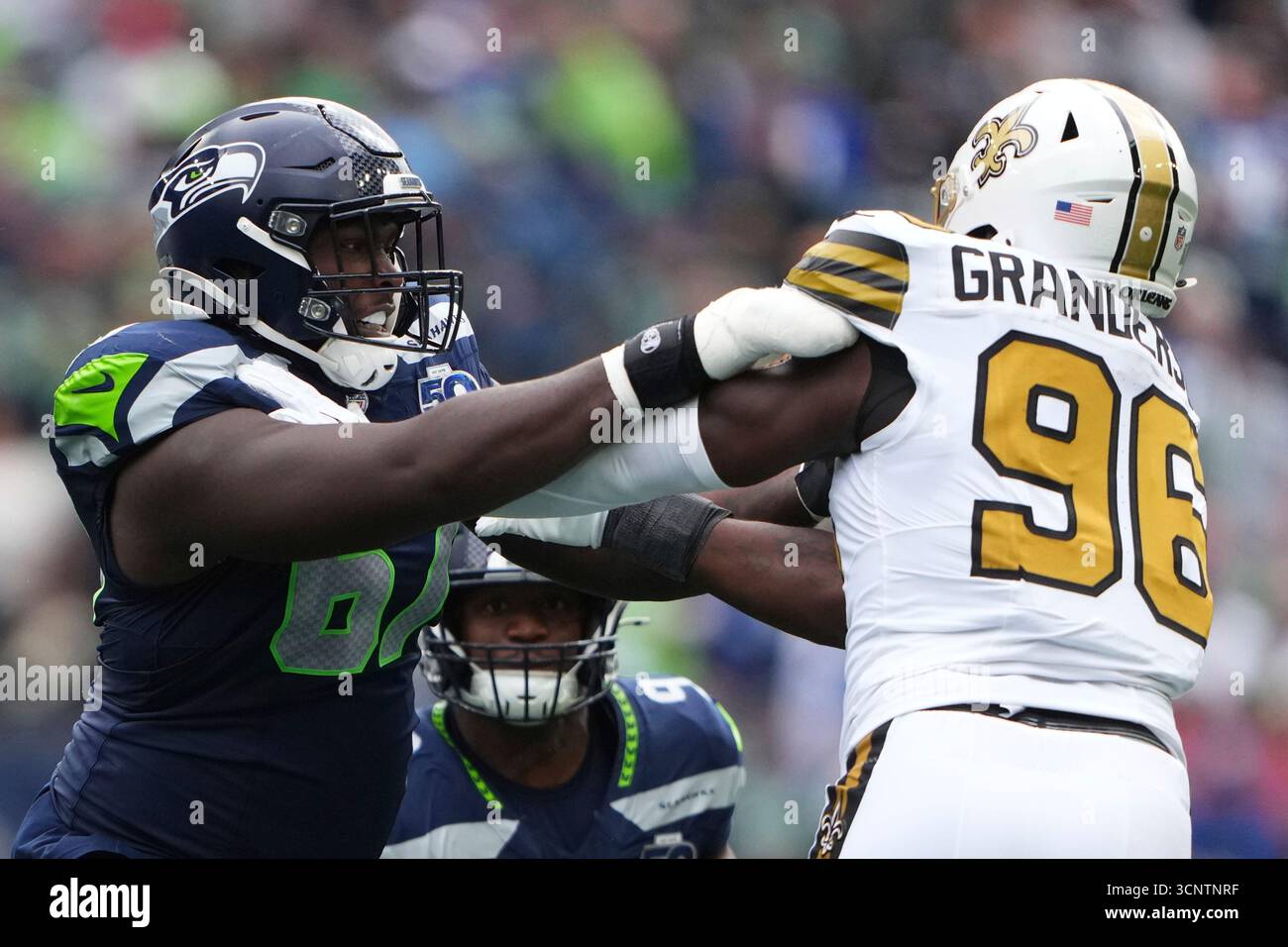 Seattle Seahawks offensive tackle Charles Cross (67) defends against ...