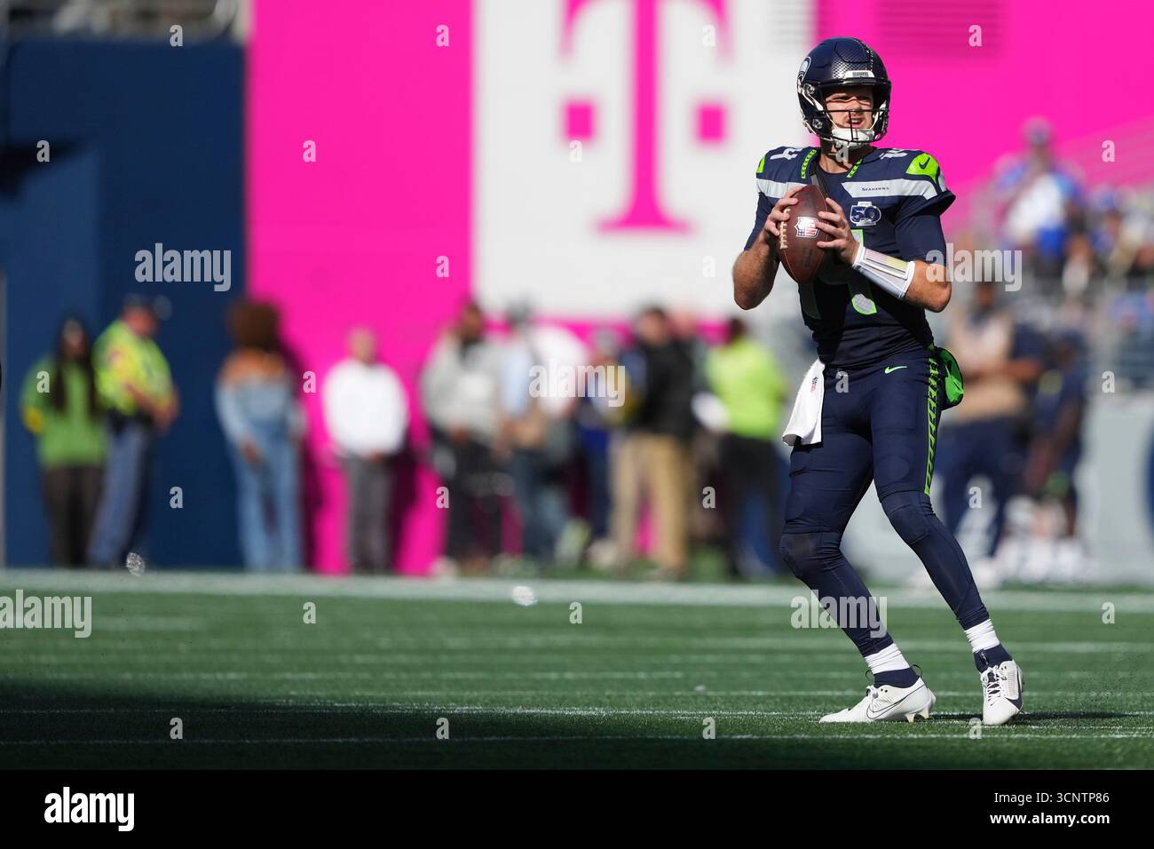 Seattle Seahawks quarterback Sam Darnold (14) looks to throw against ...