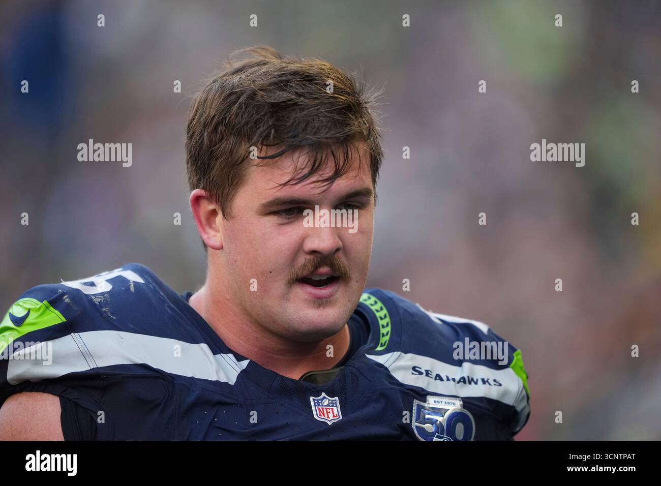 Seattle Seahawks guard Grey Zabel walks on the sideline during an NFL ...