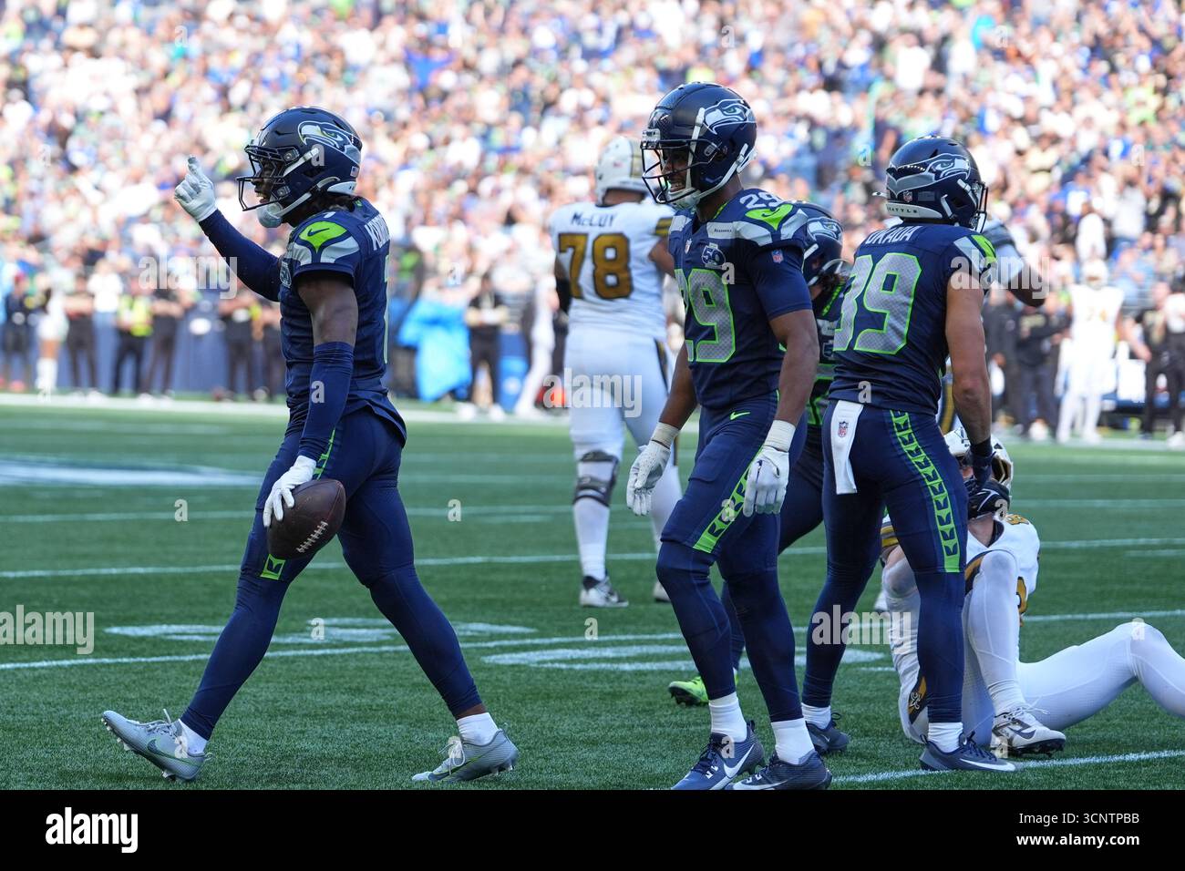 Seattle Seahawks cornerback Derion Kendrick, far left, reacts after an ...