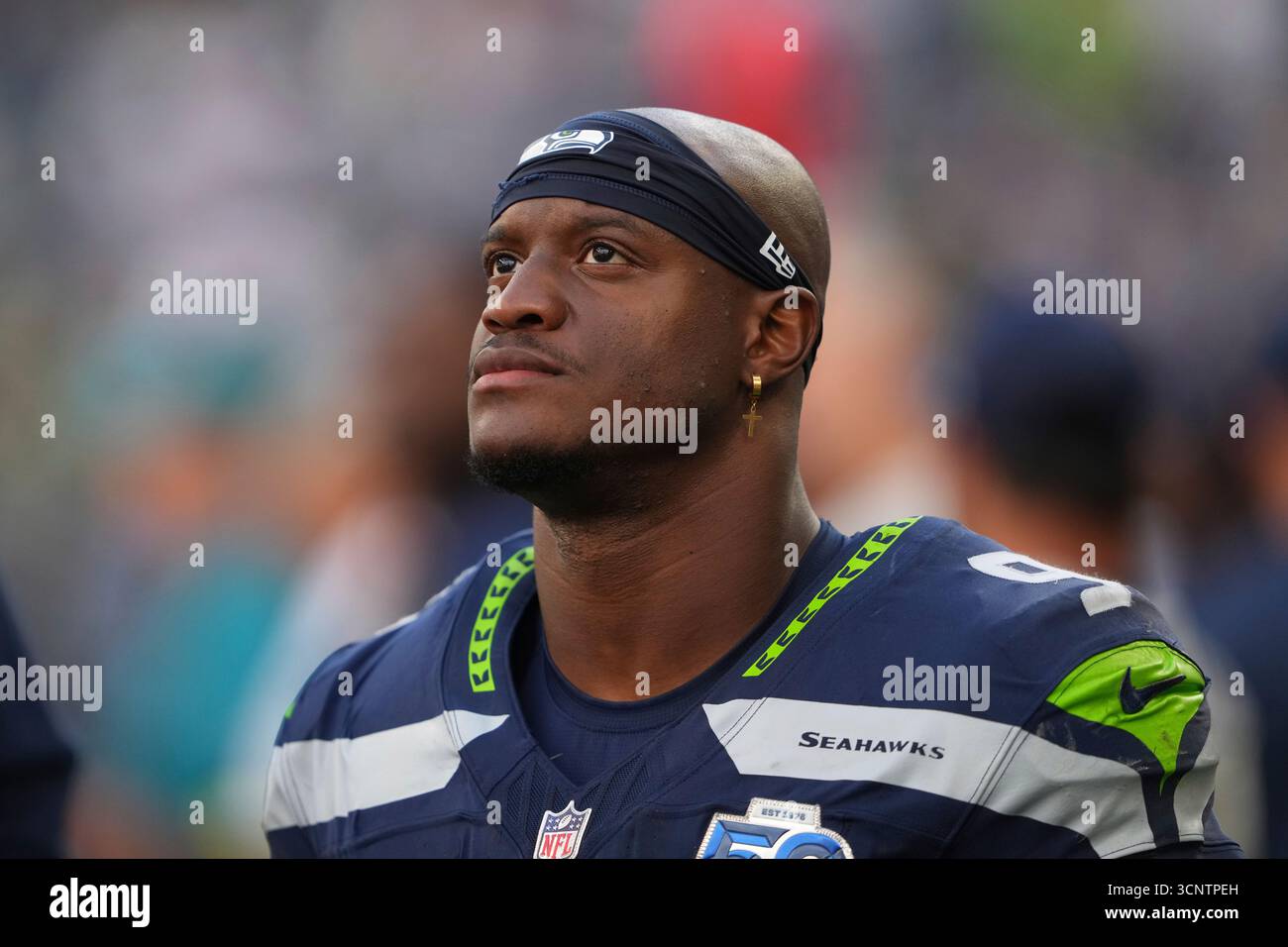 Seattle Seahawks running back Kenneth Walker III walks on the sideline ...