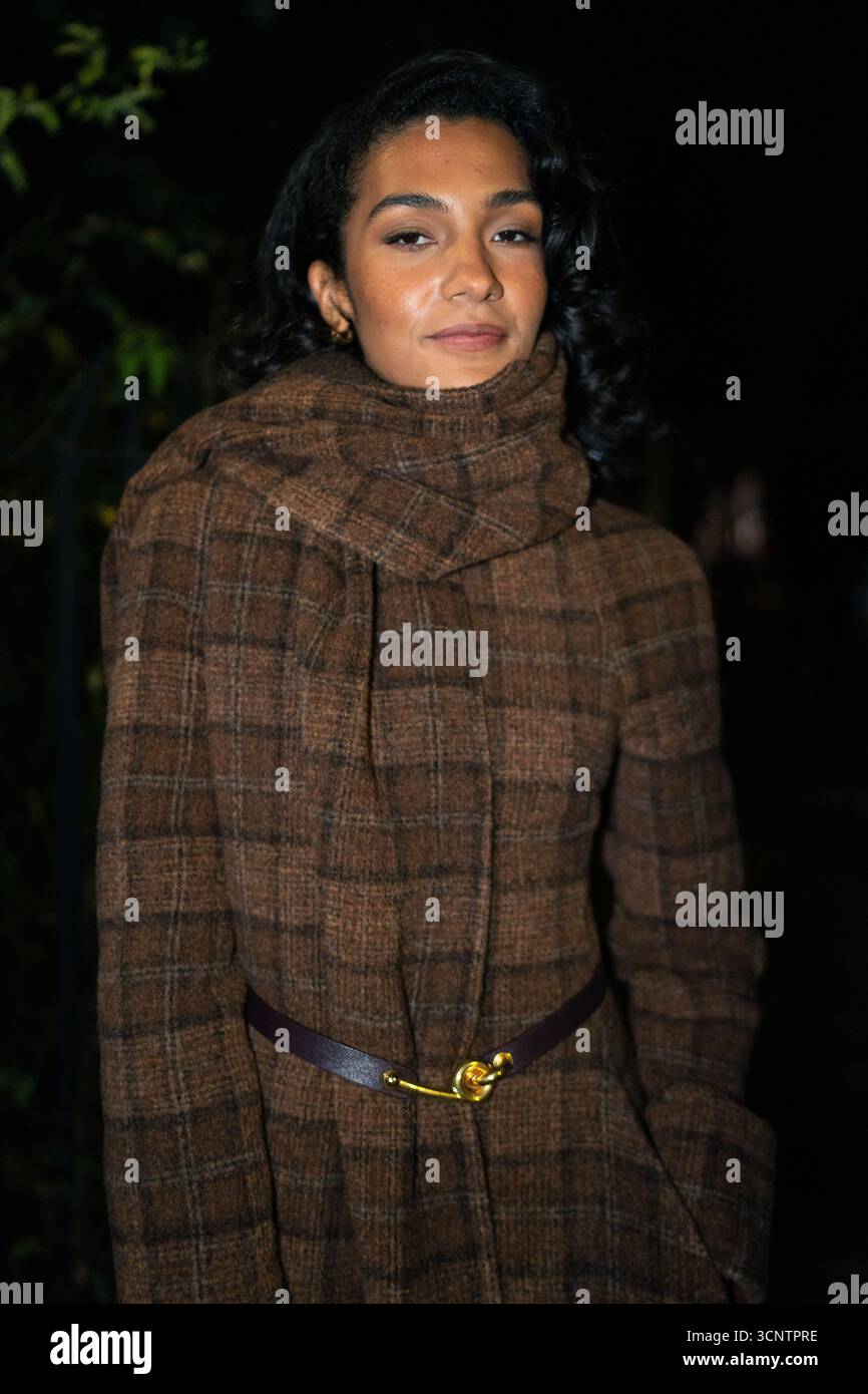 Olivia Dean attends the Burberry show during the London Fashion Week at ...